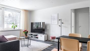 Apartamento Comfort | Sala de estar | TV de ecrã plano