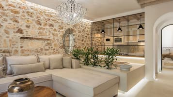 Suite Deluxe, 2 quartos, cozinha | Sala de estar