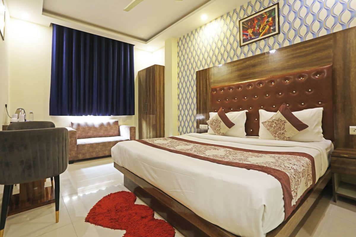 Quarto superior | Frigobar, escrivaninha, Wi-Fi de cortesia, roupa de cama