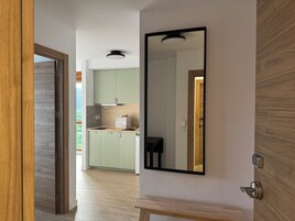 Apartamento | Área de estar | TV 49 polegadas com canais digitais