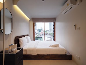 Apartamento Executivo, 4 quartos, Vista para a cidade | 4 quartos, secretária, ferro/tábua de engomar, Wi-fi grátis 
