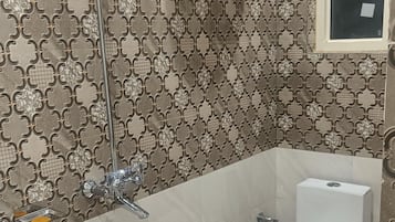 Toalhas de banho, sabonete, shampoo