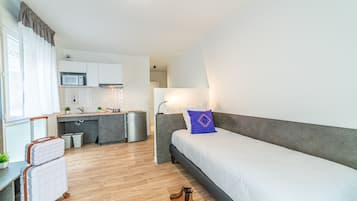 Quarto Individual Comfort | Secretária, Wi-fi grátis