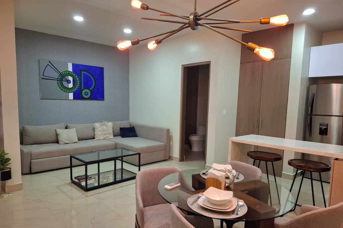Apartamento standard | Área de estar | TV LED