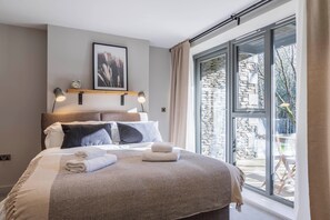 Apartamento, 2 quartos | Ferro/tábua de engomar, roupa de cama fornecida 