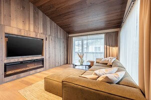 Premium Penthouse mit Sauna | Sala de estar | TV de ecrã plano