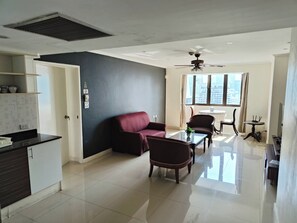 Quarto luxo | Área de estar | TV de tela plana