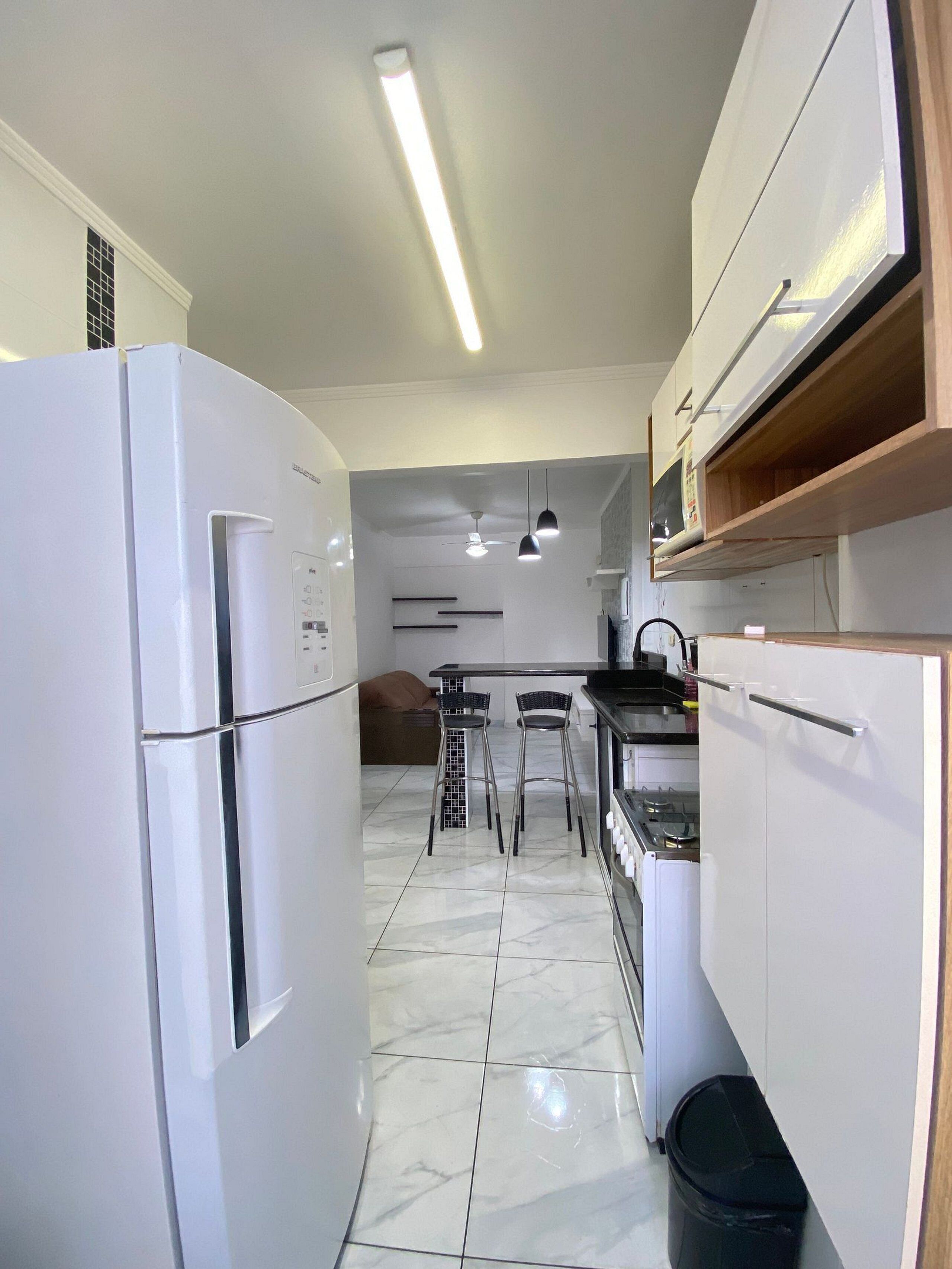 Apartamento | Cozinha privada | Utensílios de cozinha, mesas de jantar 