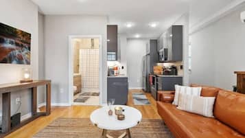 Apartamento Signature, cozinha, Vista para a cidade | Sala de estar
