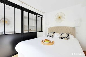 Apartamento urbano, vista para a cidade | Cortinas blackout, ferros/tábuas de passar roupa, Wi-Fi de cortesia