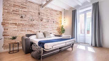 Apartamento Superior, Vista para a cidade | Sala de estar | Smart TV de 50 polegadas com canais digitais