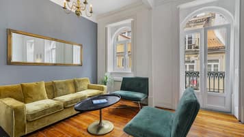 Apartamento, 1 quarto | Sala de estar | TV de ecrã plano