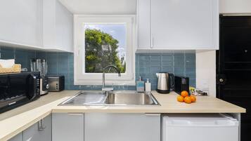 Casa, 2 quartos | Cozinha privada | Uma chaleira elétrica, uma torradeira