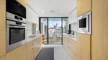 Apartamento, 1 quarto | Cozinha privada | Uma chaleira elétrica, uma torradeira