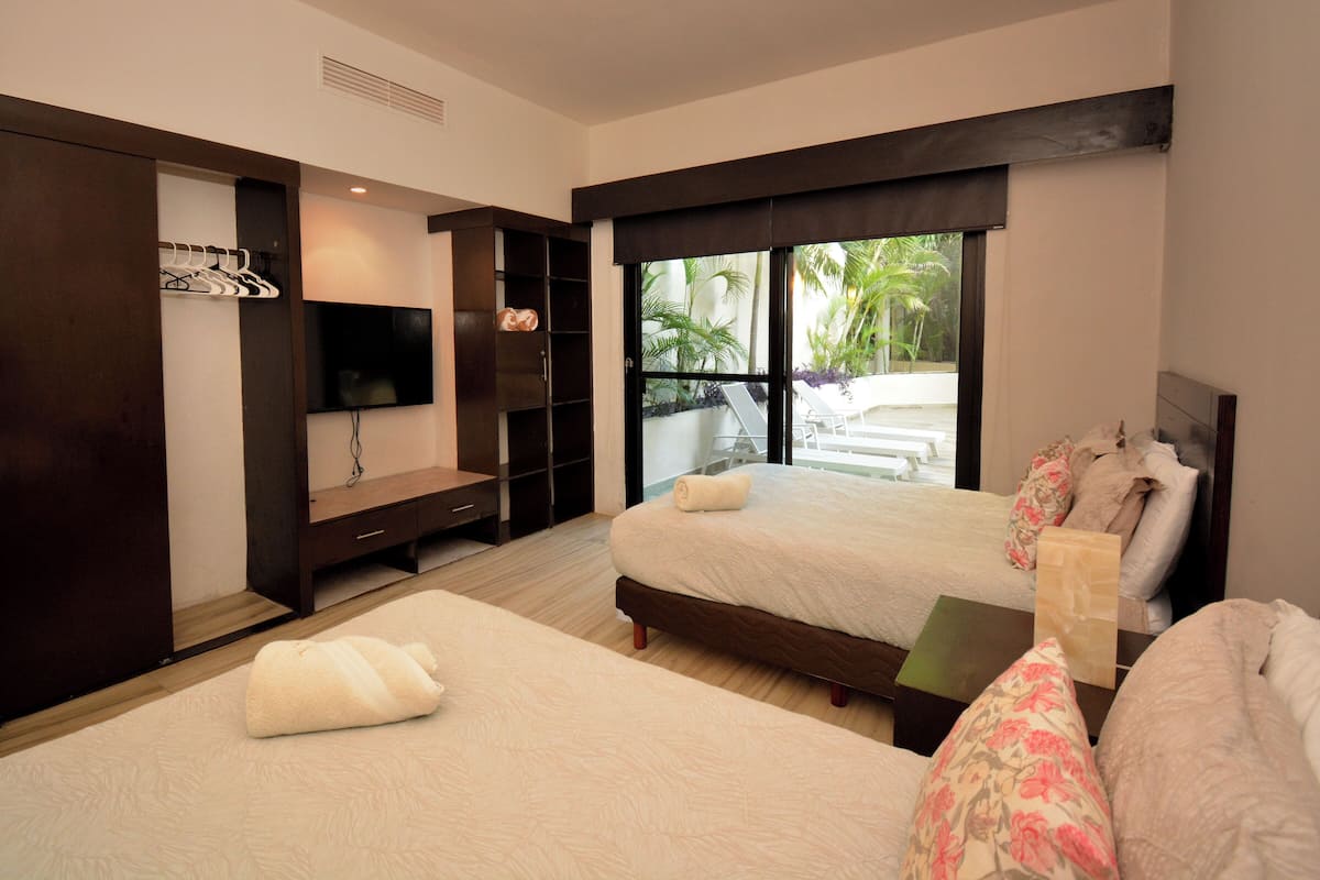 Apartamento Familiar, 2 quartos, piscina privativa | 2 quartos, ferro/tábua de engomar, Wi-fi grátis