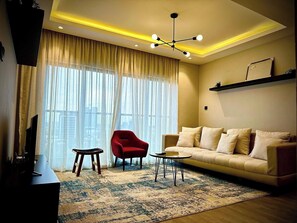 Apartamento superior | Área de estar