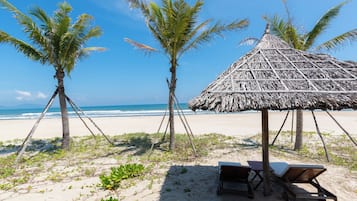 Praia particular, areia branca