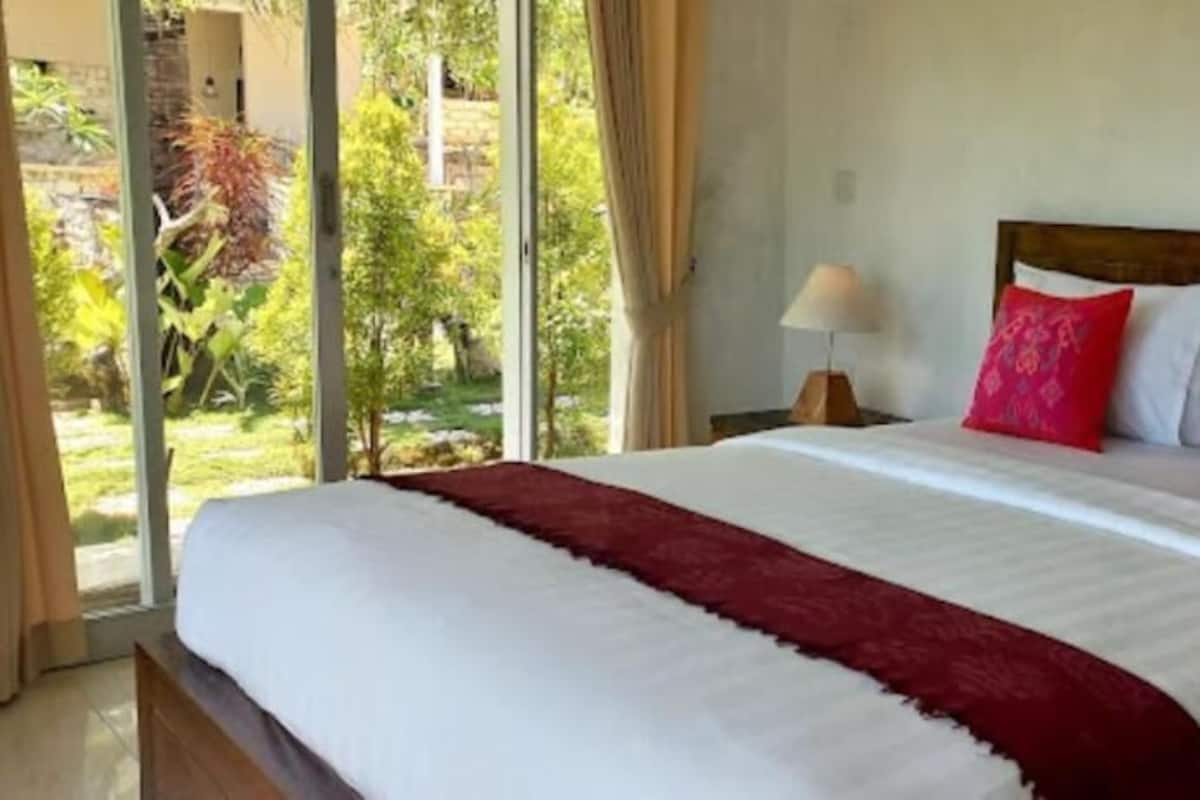 Quarto Duplo Básico, vista para o jardim | Wi-fi grátis