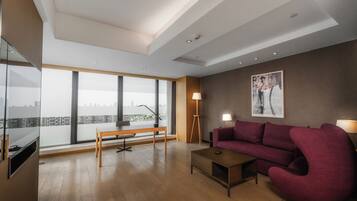 Suíte executiva | Frigobar, escrivaninha, cortinas blackout, quartos à prova de som