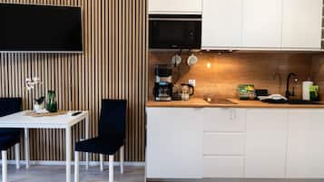 Apartamento | Cozinha privada | Cadeirão de bebê