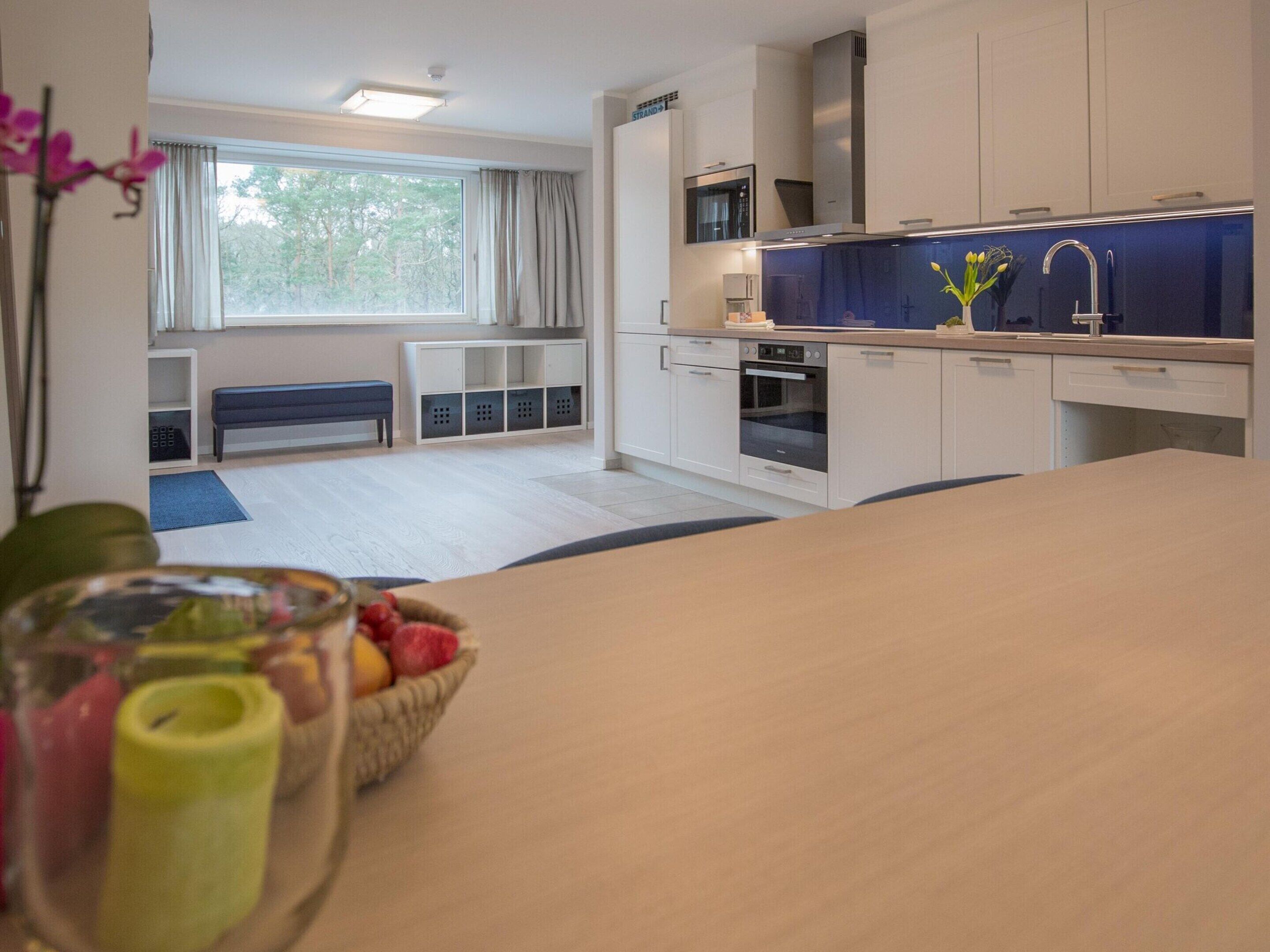 Apartamento | Cozinha privada | Uma cadeira de bebé 