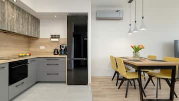 Apartamento | Cozinha privada | Cadeirão de bebê