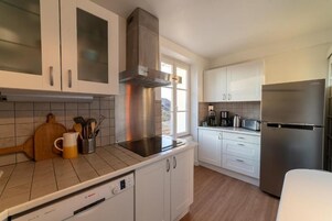 Dúplex | Cozinha privada | Uma chaleira elétrica, uma torradeira