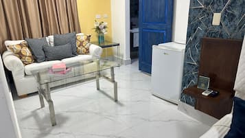 Quarto executivo | Sala de estar | TV LED 55 polegadas com canais digitais