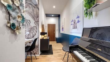 Apartamento | Sala de estar | TV de tela plana 24 polegadas com canais digitais