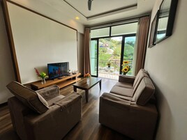 Área de estar | TV LED 48 polegadas com canais digitais