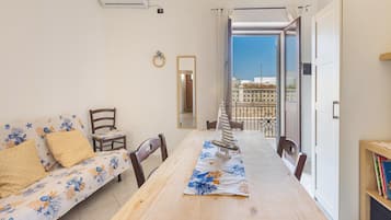 Apartamento | Área de estar | TV de tela plana