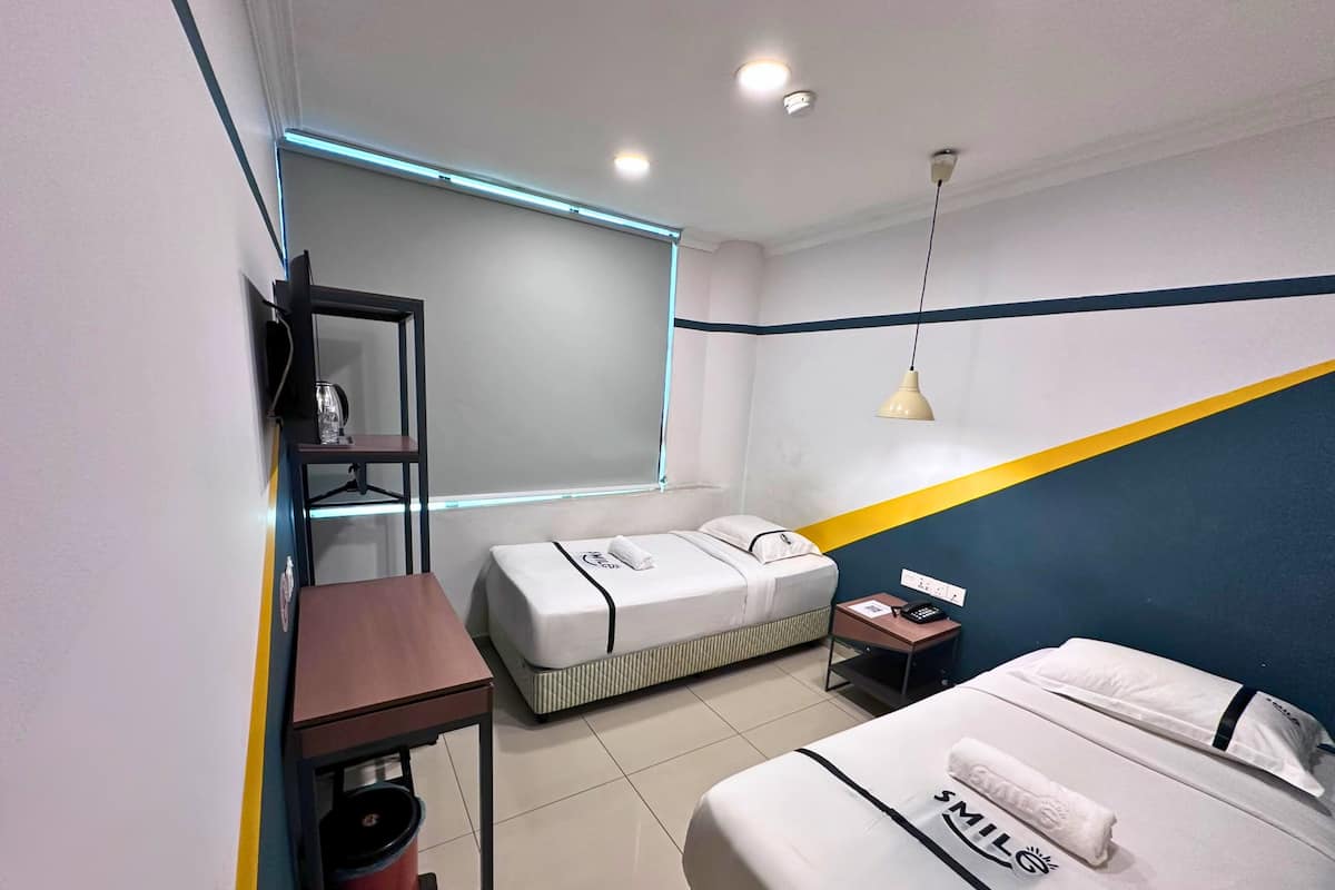 Quarto Twin | Secretária, ferro/tábua de engomar, Wi-fi grátis