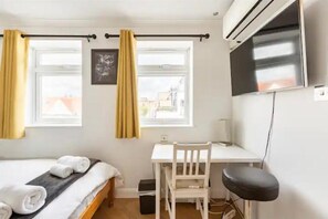 Apartamento | 2 quartos, ferros/tábuas de passar roupa, Wi-Fi de cortesia