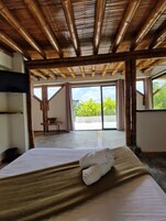 Apartamento Deluxe, vista para o jardim | Cortinas/cortinados opacos, ferro/tábua de engomar, Wi-fi grátis 