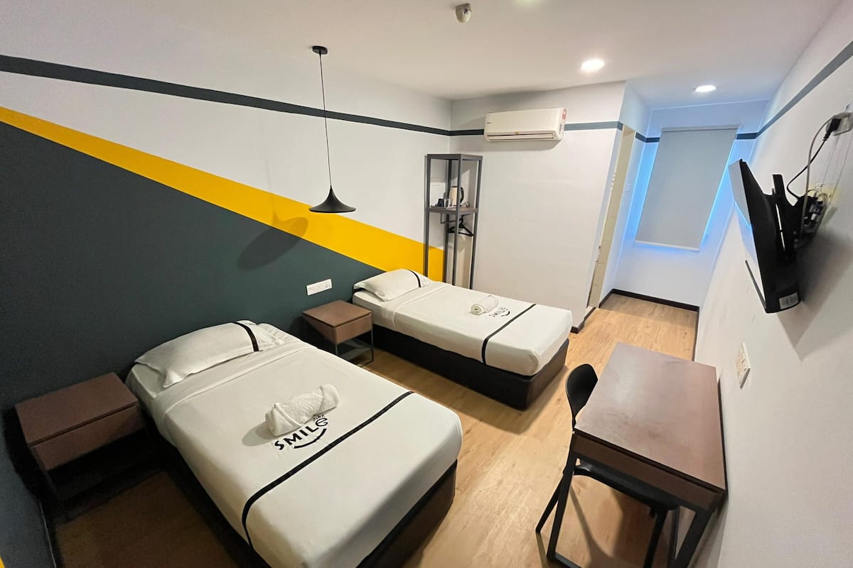 Quarto Twin | Secretária, ferro/tábua de engomar, Wi-fi grátis
