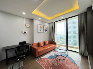 Apartamento urbano, 1 quarto | Área de estar