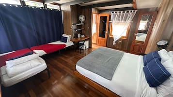 Suíte premium | 1 quarto, cofres nos quartos, Wi-Fi de cortesia, roupa de cama