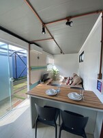 Casa Coral 02 - Kaia Mar - Campeche | Área de estar | Smart TV 32 polegadas com canais digitais, Netflix