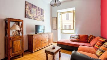 Apartamento urbano, ar-condicionado, vista para a cidade | Área de estar