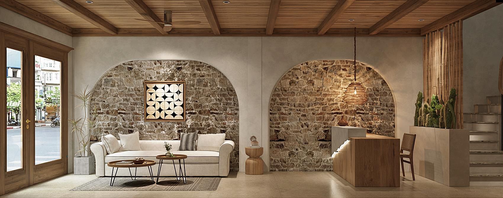 Um interior moderno com uma parede de pedra, um sofá branco, uma mesa de centro e um candeeiro suspenso.