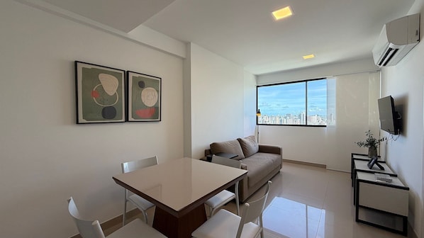 Apartamento Comfort | Sala de estar | Televisor 