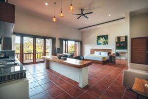 Suite Deluxe, 1 cama king-size | Minibar, cofre no quarto, secretária, quartos insonorizados