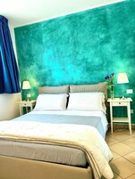 Suíte | Frigobar, cofres nos quartos, individualmente decorados, escrivaninha