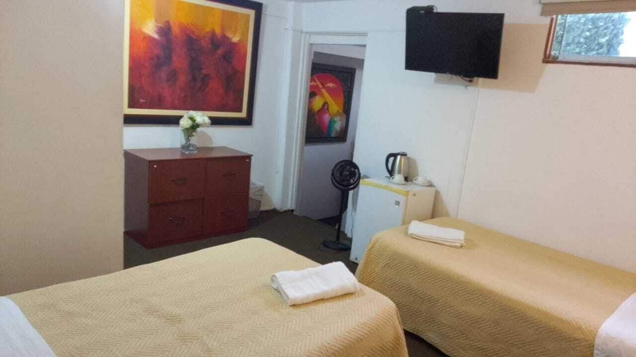 Quarto Triplo Standard | Ferro/tábua de engomar, Wi-fi grátis, roupa de cama fornecida 