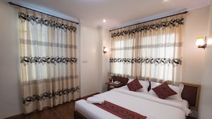 Quarto Standard | Minibar, cofre no quarto, secretária, cortinas/cortinados opacos 