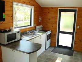 Apartamento, 2 Quartos | Cozinha privada | Um frigorífico no espaço comum, um micro-ondas no espaço comum 