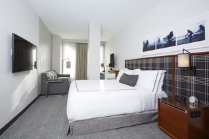 Estúdio | Lençóis italianos Frette, roupas de cama premium, frigobar