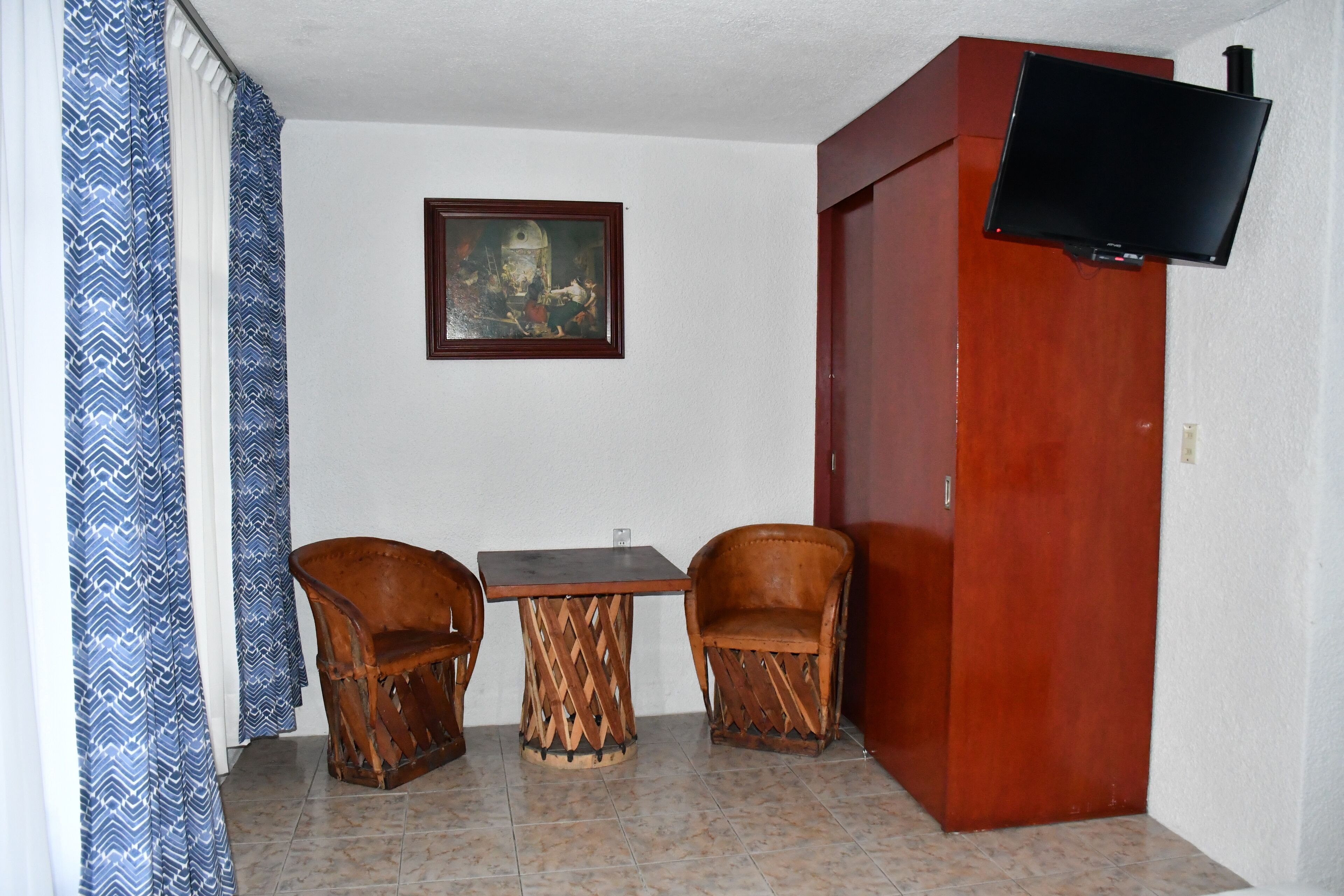 Quarto standard | Área de estar | TV