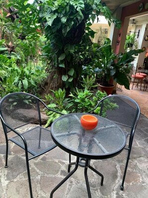 Quarto Individual | Vista para o pátio
