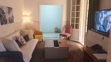 Apartamento Cidade | Sala de estar | Televisor LCD